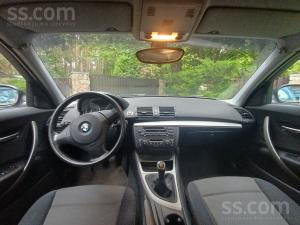 Black BMW 116 2005 in Riga, with an engine capacity of 1.60 L and mileage of 256 thousand km for 1500 €, photo 9 on AUTOMOTO.COM.LV