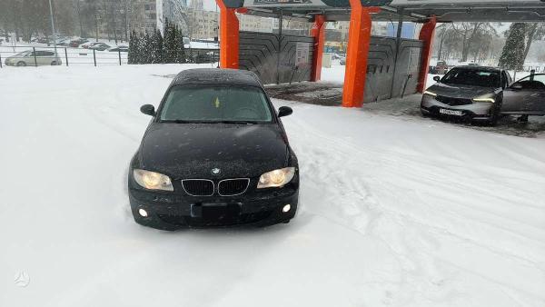 Black BMW 116 2007 in Vilnius, with an engine capacity of 1.60 L and mileage of 250 thousand km for 1499 €, photo 1 on AUTOMOTO.COM.LV