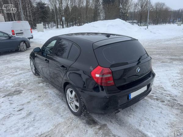 Black BMW 116 2007 in Kaunas, with an engine capacity of 2.00 L and mileage of 240 thousand km for 2150 €, photo 4 on AUTOMOTO.COM.LV