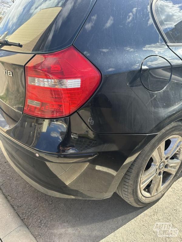 Black BMW 116 2007 in Mazeikiai, with an engine capacity of 1.60 L and mileage of 288 thousand km for 1700 €, photo 9 on AUTOMOTO.COM.LV