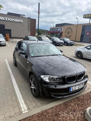 Black BMW 116 2007 in Riga, with an engine capacity of 1.60 L and mileage of 178 thousand km for 2975 €, photo 4 on AUTOMOTO.COM.LV