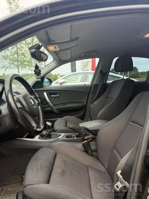 Black BMW 116 2007 in Riga, with an engine capacity of 1.60 L and mileage of 178 thousand km for 2975 €, photo 13 on AUTOMOTO.COM.LV