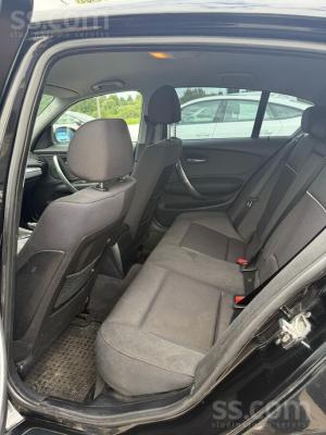 Black BMW 116 2007 in Riga, with an engine capacity of 1.60 L and mileage of 178 thousand km for 2975 €, photo 14 on AUTOMOTO.COM.LV