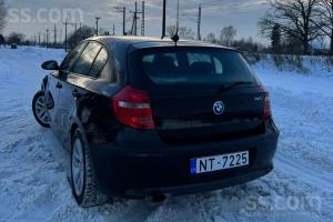 Black BMW 116 2008 in Riga, with an engine capacity of 1.60 L and mileage of 300 thousand km for 3550 €, photo 4 on AUTOMOTO.COM.LV