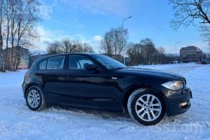 Black BMW 116 2008 in Riga, with an engine capacity of 1.60 L and mileage of 300 thousand km for 3550 €, photo 5 on AUTOMOTO.COM.LV