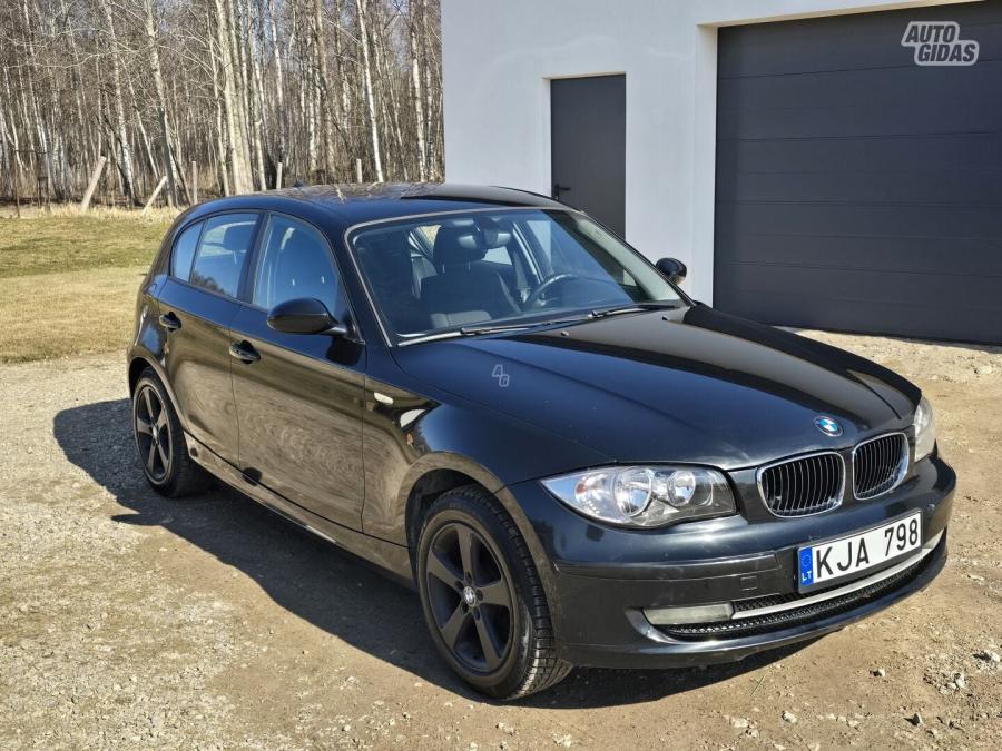 Black BMW 116 2008 in Siauliai, with an engine capacity of 1.60 L and mileage of 217 thousand km for 1550 €, photo 1 on AUTOMOTO.COM.LV