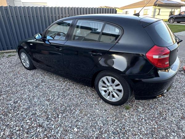 Black BMW 116 2008 in Klaipeda, with an engine capacity of 1.60 L and mileage of 215 thousand km for 1600 €, photo 1 on AUTOMOTO.COM.LV