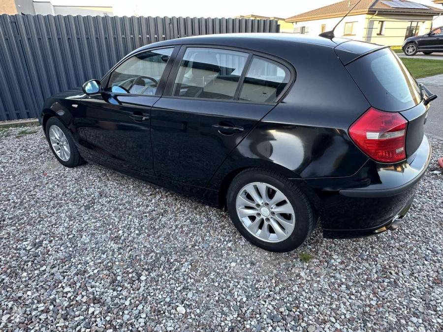 Black BMW 116 2008 in Klaipeda, with an engine capacity of 1.60 L and mileage of 215 thousand km for 1600 €, photo 1 on AUTOMOTO.COM.LV