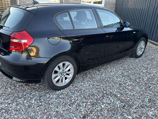 Black BMW 116 2008 in Klaipeda, with an engine capacity of 1.60 L and mileage of 215 thousand km for 1600 €, photo 3 on AUTOMOTO.COM.LV