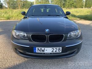 Black BMW 116 2009 in Ogre, with an engine capacity of 2.00 L and mileage of 108 thousand km for 2670 €, photo 2 on AUTOMOTO.COM.LV
