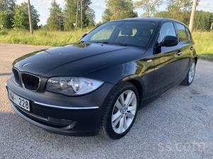 Black BMW 116 2009 in Ogre, with an engine capacity of 2.00 L and mileage of 108 thousand km for 2670 €, photo 3 on AUTOMOTO.COM.LV