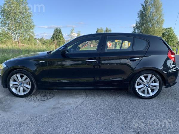 Black BMW 116 2009 in Ogre, with an engine capacity of 2.00 L and mileage of 108 thousand km for 2670 €, photo 4 on AUTOMOTO.COM.LV