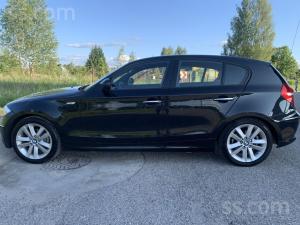 Black BMW 116 2009 in Ogre, with an engine capacity of 2.00 L and mileage of 108 thousand km for 2670 €, photo 4 on AUTOMOTO.COM.LV