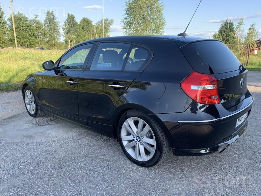 Black BMW 116 2009 in Ogre, with an engine capacity of 2.00 L and mileage of 108 thousand km for 2670 €, photo 5 on AUTOMOTO.COM.LV