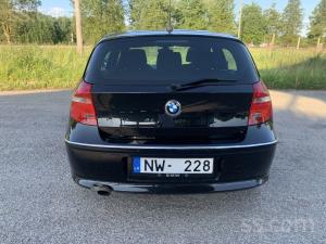 Black BMW 116 2009 in Ogre, with an engine capacity of 2.00 L and mileage of 108 thousand km for 2670 €, photo 6 on AUTOMOTO.COM.LV