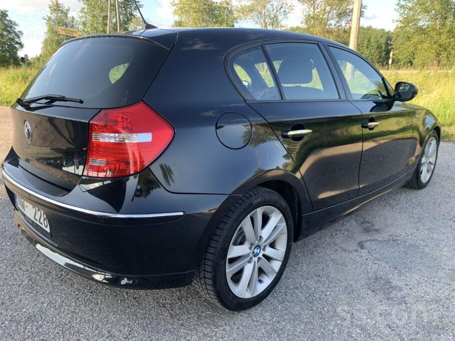 Black BMW 116 2009 in Ogre, with an engine capacity of 2.00 L and mileage of 108 thousand km for 2670 €, photo 7 on AUTOMOTO.COM.LV