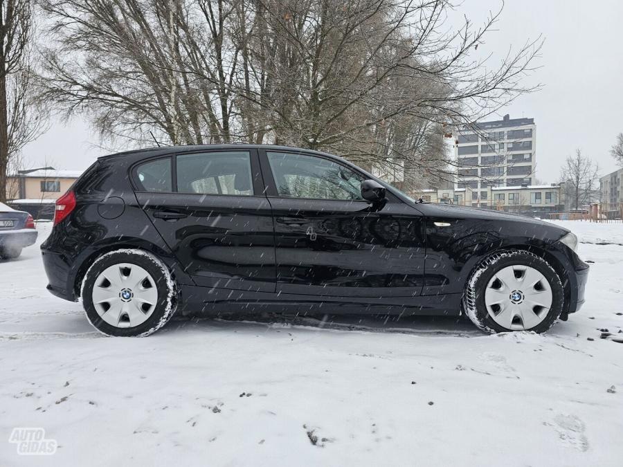 Black BMW 116 2009 in Kaunas, with an engine capacity of 2.00 L and mileage of 209 thousand km for 3650 €, photo 3 on AUTOMOTO.COM.LV