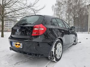 Black BMW 116 2009 in Kaunas, with an engine capacity of 2.00 L and mileage of 209 thousand km for 3650 €, photo 4 on AUTOMOTO.COM.LV