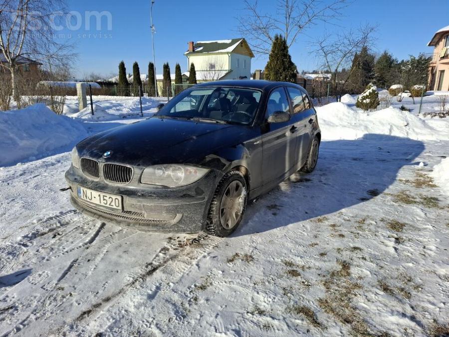 Black BMW 116 2009 in Riga, with an engine capacity of 1.60 L and mileage of 230 thousand km for 1590 €, photo 1 on AUTOMOTO.COM.LV