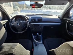 Black BMW 116 2009 in Riga, with an engine capacity of 1.60 L and mileage of 230 thousand km for 1590 €, photo 8 on AUTOMOTO.COM.LV