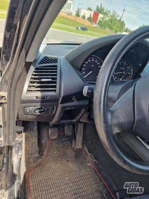Black BMW 116 2009 in Kaunas, with an engine capacity of 1.60 L and mileage of 203 thousand km for 2900 €, photo 14 on AUTOMOTO.COM.LV