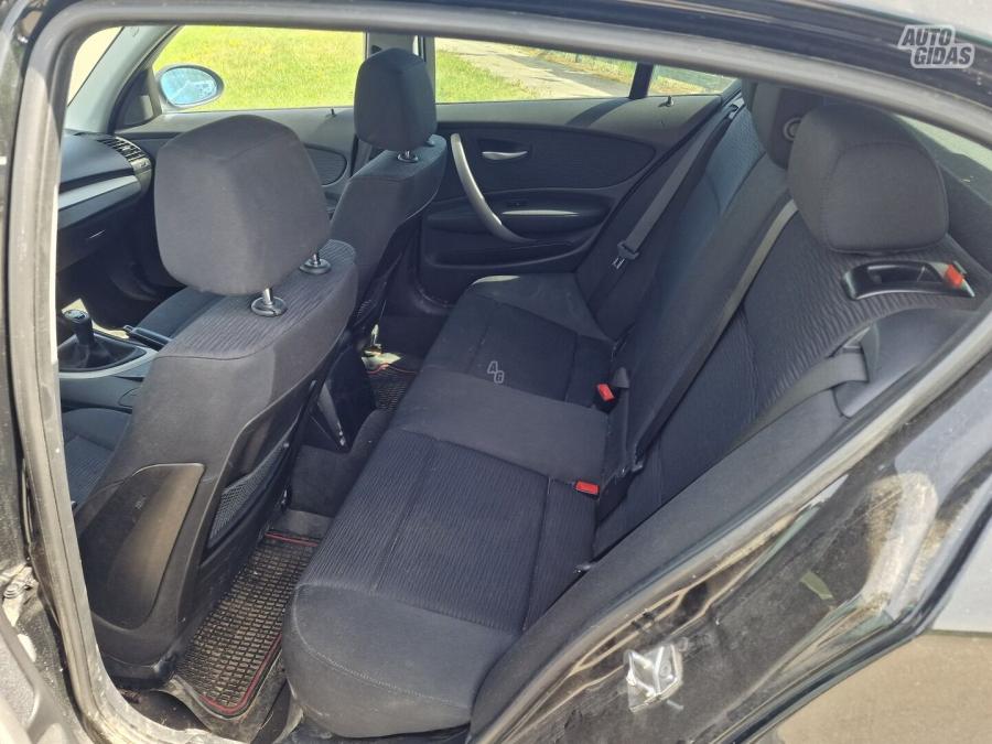 Black BMW 116 2009 in Kaunas, with an engine capacity of 1.60 L and mileage of 203 thousand km for 2900 €, photo 22 on AUTOMOTO.COM.LV