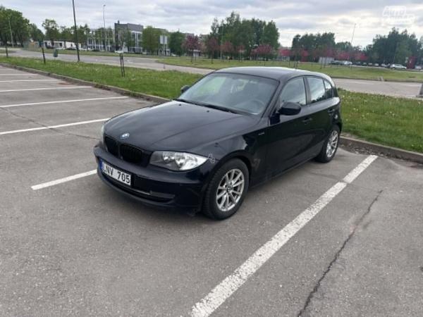 Black BMW 116 2009 in Kaunas, with an engine capacity of 2.00 L and mileage of 299 thousand km for 2200 €, photo 5 on AUTOMOTO.COM.LV