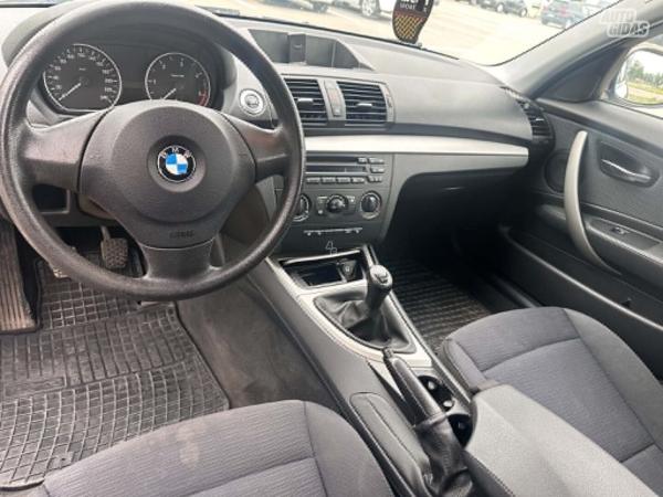 Black BMW 116 2009 in Kaunas, with an engine capacity of 2.00 L and mileage of 299 thousand km for 2200 €, photo 6 on AUTOMOTO.COM.LV