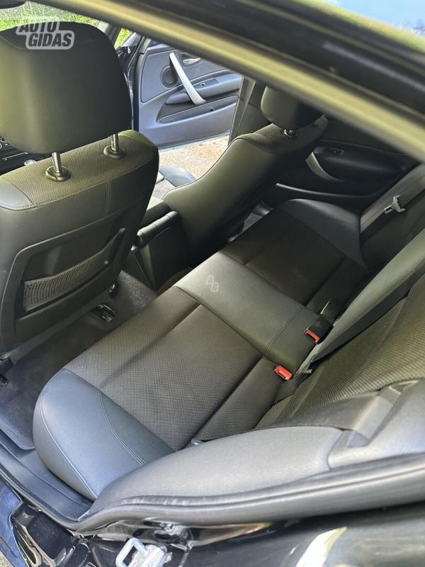 Black BMW 116 2009 in Vilnius, with an engine capacity of 2.00 L and mileage of 284 thousand km for 3800 €, photo 7 on AUTOMOTO.COM.LV