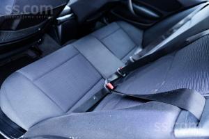 Black BMW 116 2009 in Riga, with an engine capacity of 1.60 L and mileage of 187 thousand km for 4790 €, photo 13 on AUTOMOTO.COM.LV