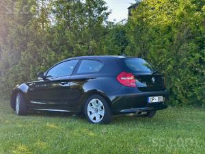 Black BMW 116 2009 in Riga, with an engine capacity of 2.00 L and mileage of 176 thousand km for 2950 €, photo 3 on AUTOMOTO.COM.LV