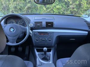 Black BMW 116 2009 in Riga, with an engine capacity of 2.00 L and mileage of 176 thousand km for 2950 €, photo 7 on AUTOMOTO.COM.LV