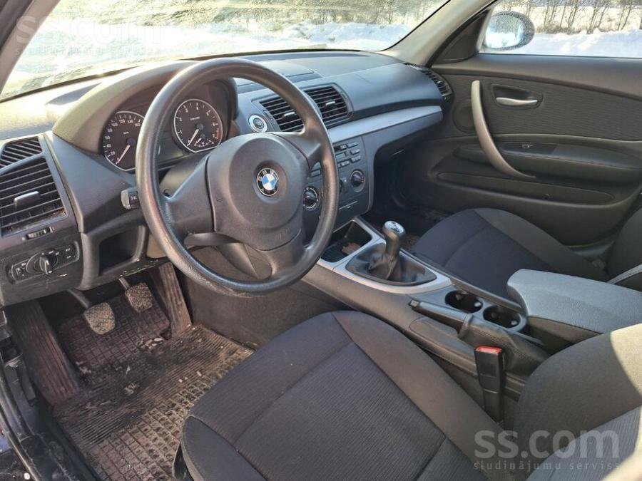 Black BMW 116 2009 in Riga, with an engine capacity of 1.60 L and mileage of 230 thousand km for 1150 €, photo 6 on AUTOMOTO.COM.LV
