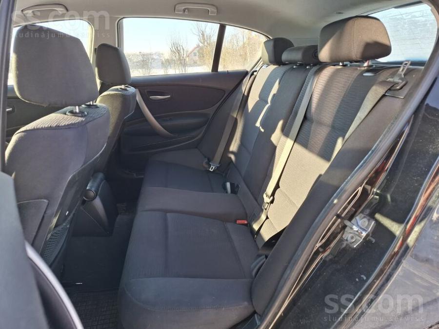Black BMW 116 2009 in Riga, with an engine capacity of 1.60 L and mileage of 230 thousand km for 1150 €, photo 8 on AUTOMOTO.COM.LV
