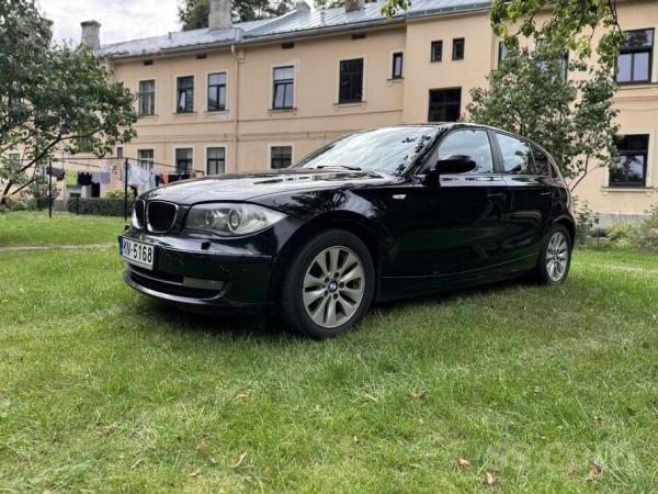 Black BMW 116 2009 in Valmiera, with an engine capacity of 2.00 L and mileage of 0 thousand km for 2300 €, photo 3 on AUTOMOTO.COM.LV