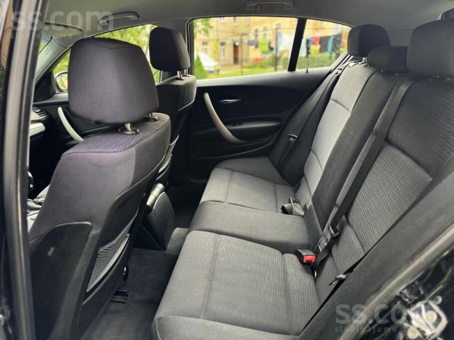 Black BMW 116 2009 in Valmiera, with an engine capacity of 2.00 L and mileage of 0 thousand km for 2300 €, photo 7 on AUTOMOTO.COM.LV