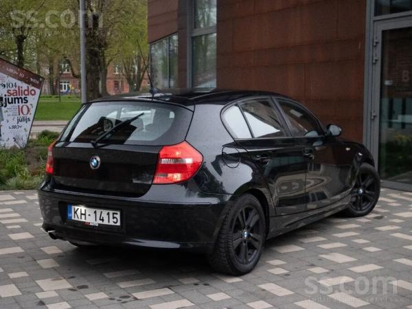 Black BMW 116 2009 in Riga, with an engine capacity of 2.00 L and mileage of 180 thousand km for 4500 €, photo 7 on AUTOMOTO.COM.LV