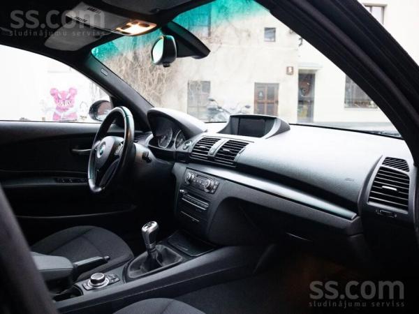 Black BMW 116 2009 in Riga, with an engine capacity of 2.00 L and mileage of 180 thousand km for 4500 €, photo 11 on AUTOMOTO.COM.LV
