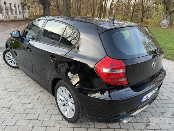 Black BMW 116 2010 in Riga, with an engine capacity of 2.00 L and mileage of 281 thousand km for 4350 €, photo 8 on AUTOMOTO.COM.LV