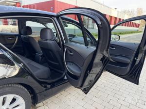 Black BMW 116 2010 in Riga, with an engine capacity of 2.00 L and mileage of 281 thousand km for 4350 €, photo 12 on AUTOMOTO.COM.LV