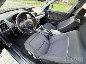 Black BMW 116 2010 in Riga, with an engine capacity of 2.00 L and mileage of 281 thousand km for 4350 €, photo 16 on AUTOMOTO.COM.LV