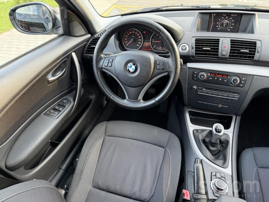 Black BMW 116 2010 in Riga, with an engine capacity of 2.00 L and mileage of 281 thousand km for 4350 €, photo 19 on AUTOMOTO.COM.LV