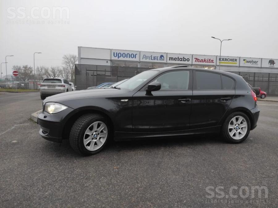 Black BMW 116 2010 in Riga, with an engine capacity of 2.00 L and mileage of 213 thousand km for 5000 €, photo 1 on AUTOMOTO.COM.LV