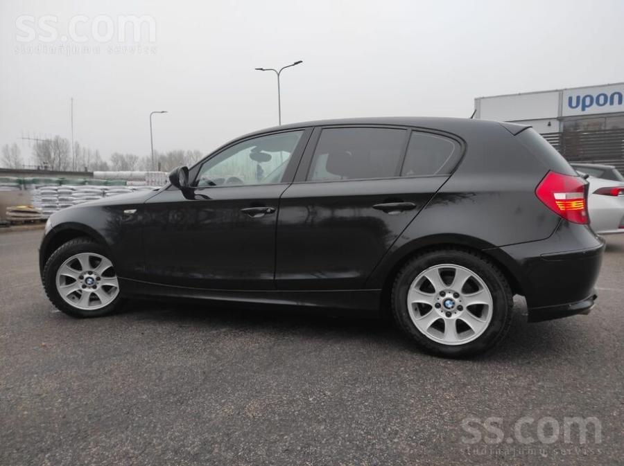 Black BMW 116 2010 in Riga, with an engine capacity of 2.00 L and mileage of 213 thousand km for 5000 €, photo 2 on AUTOMOTO.COM.LV