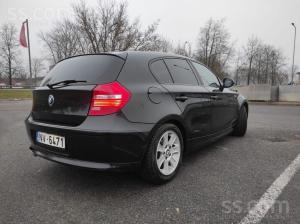 Black BMW 116 2010 in Riga, with an engine capacity of 2.00 L and mileage of 213 thousand km for 5000 €, photo 5 on AUTOMOTO.COM.LV