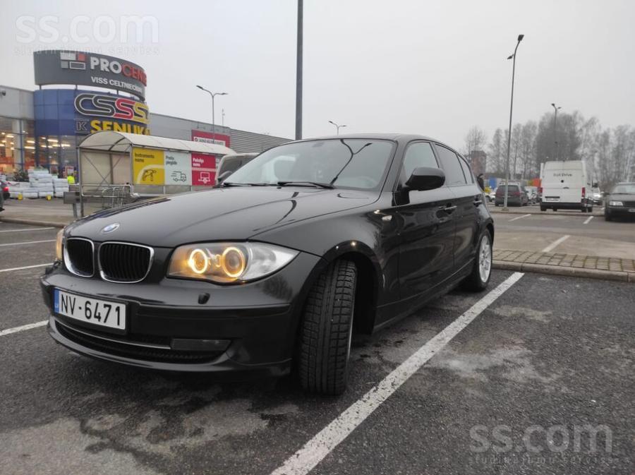 Black BMW 116 2010 in Riga, with an engine capacity of 2.00 L and mileage of 213 thousand km for 5000 €, photo 7 on AUTOMOTO.COM.LV