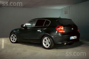 Black BMW 116 2010 in Riga, with an engine capacity of 2.00 L and mileage of 250 thousand km for 3870 €, photo 5 on AUTOMOTO.COM.LV