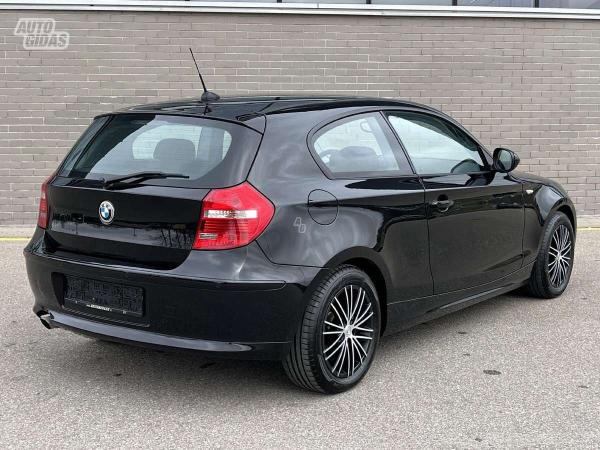 Black BMW 116 2010 in Kedainiai, with an engine capacity of 2.00 L and mileage of 218 thousand km for 3850 €, photo 4 on AUTOMOTO.COM.LV