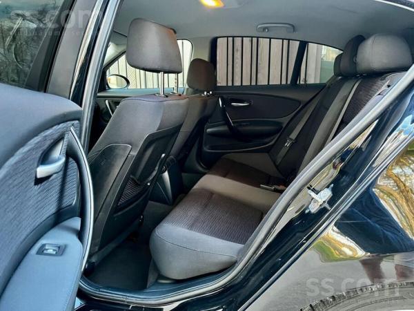 Melns BMW 116 2010 Valmiera, ar dzinēja tilpumu 2.00 L un nobraukumu 299 tūkst. km par 3950 €, foto 7 vietnē AUTOMOTO.COM.LV