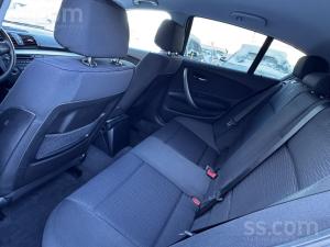 Black BMW 116 2010 in Daugavpils, with an engine capacity of 2.00 L and mileage of 0 thousand km for 4690 €, photo 18 on AUTOMOTO.COM.LV
